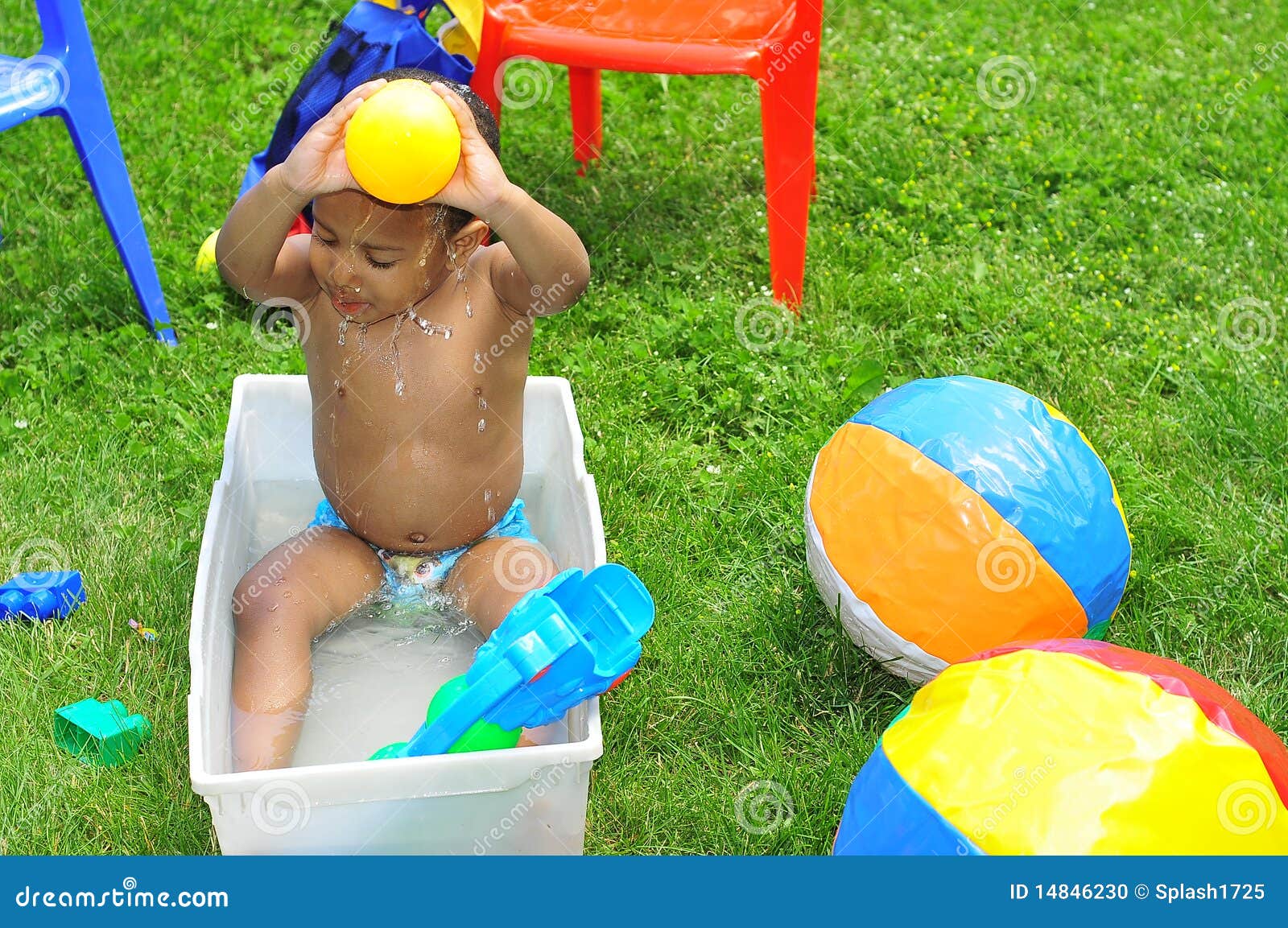 Child Cooling Off with Water Stock Photo - Image of toys, child: 14846230
