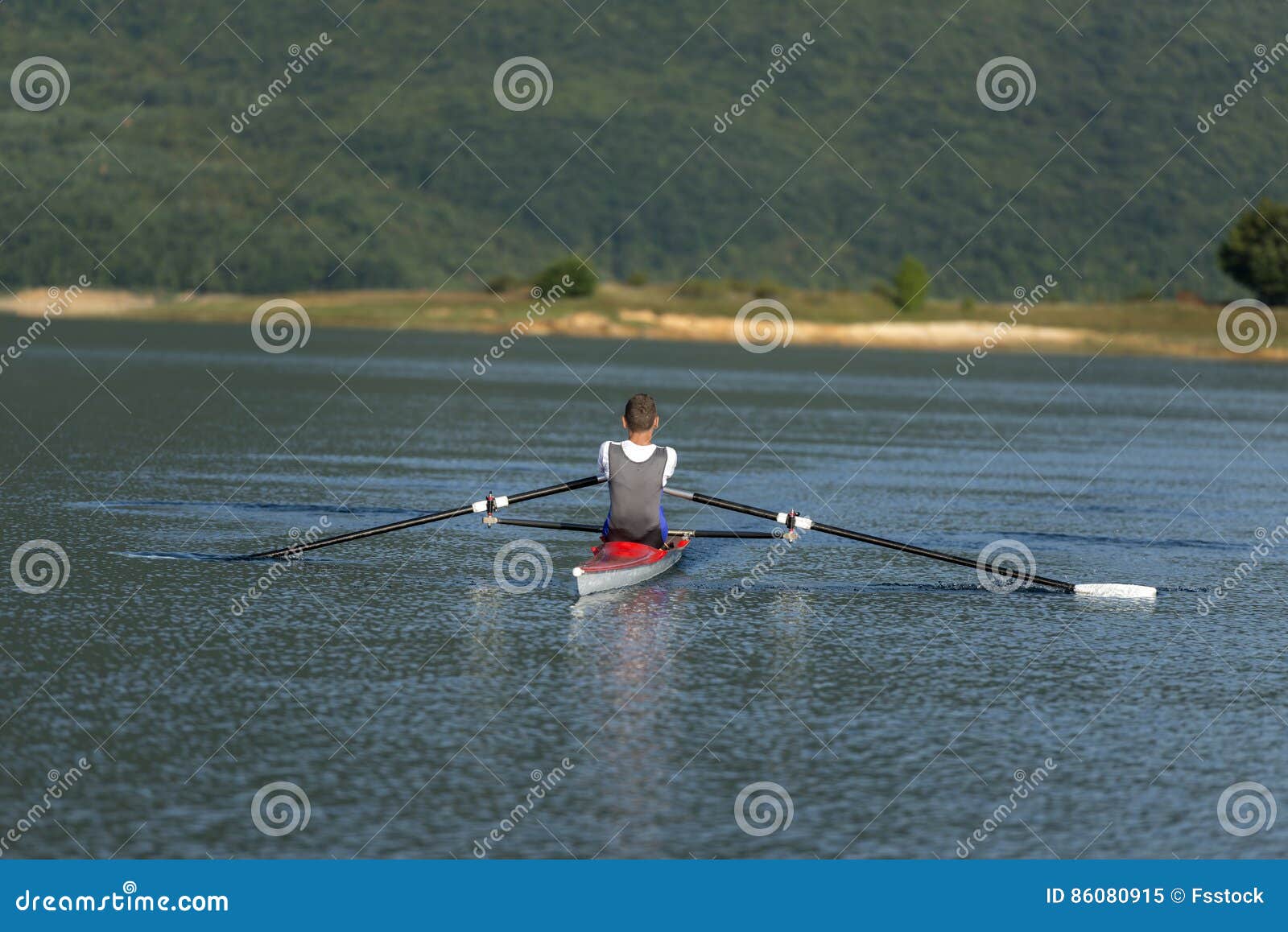 Child in the Course of Rowing on Single Stock Image - Image of rowing ...
