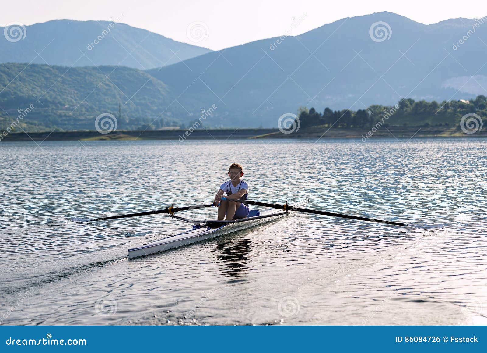 Child in the Course of Rowing on Single Stock Photo - Image of outdoors ...