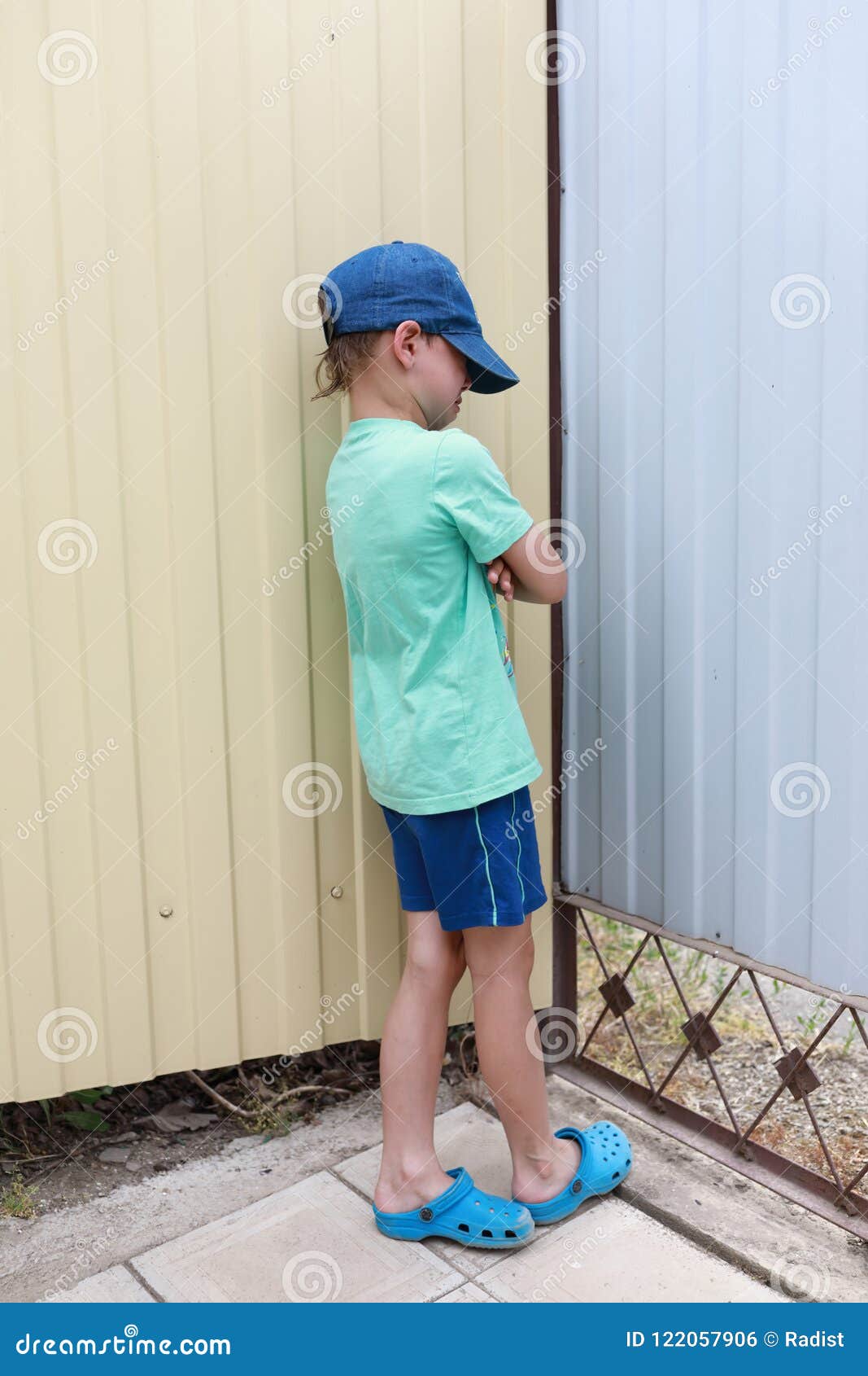 Child crying in corner stock photo. Image of domestic - 122057906