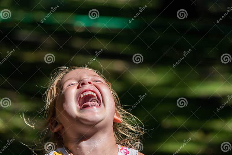 The Child is Crying and Laughing, the Child is Hysterical Stock Photo ...