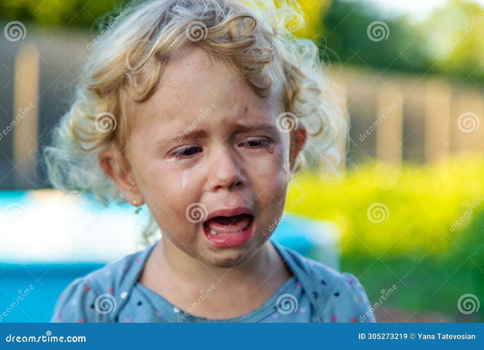 A Child is Crying on the Street. Selective Focus Stock Image - Image of ...
