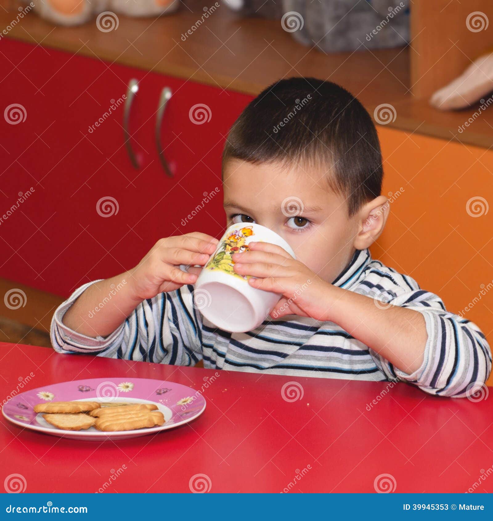 Child with cup stock image. Image of hand, happiness - 39945353