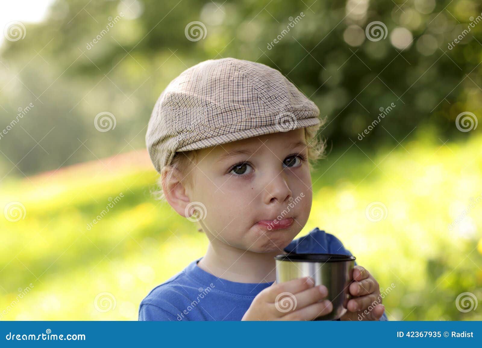 Child with cup of tea stock image. Image of beverage - 42367935