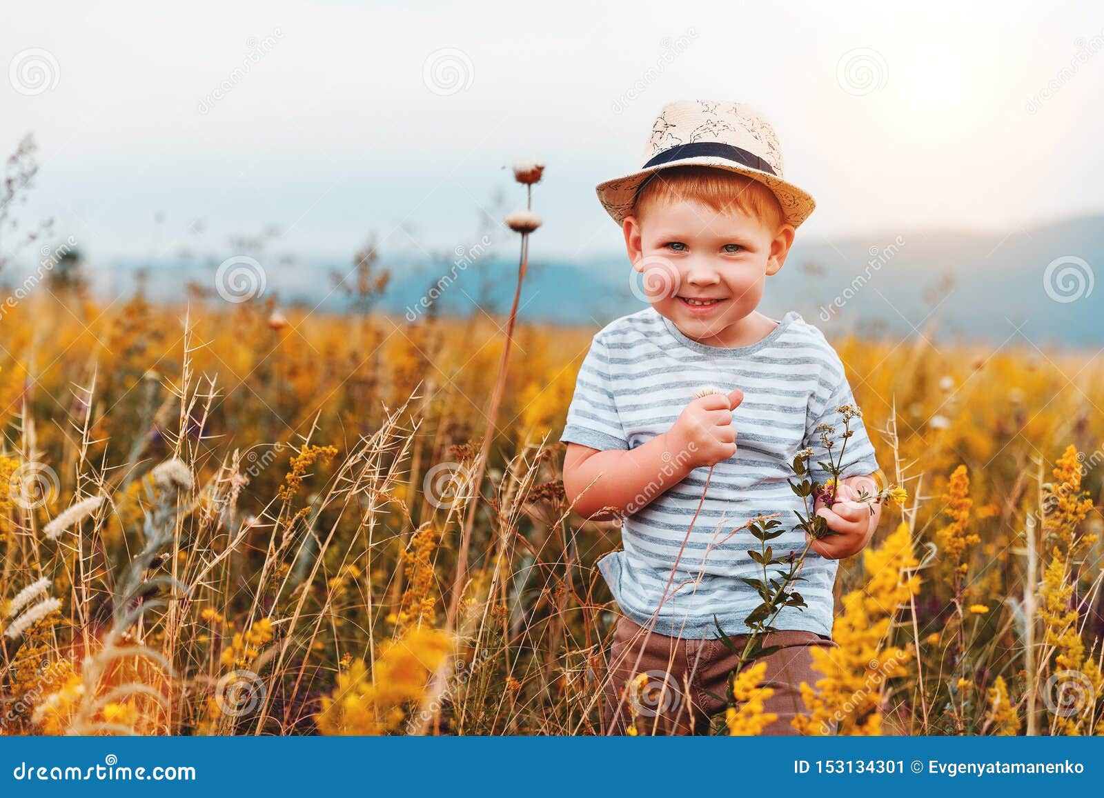 Child Cute Boy with the Hat on Nature at Sunset Stock Image - Image of ...