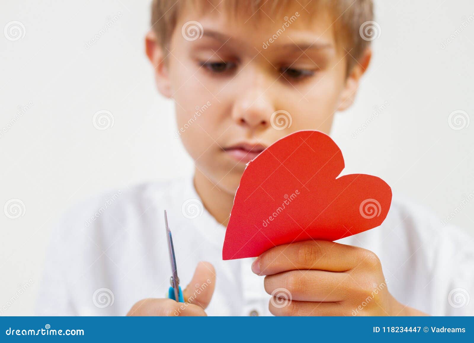 Child Cutting Red Paper Heart with Scissors Stock Image - Image of ...