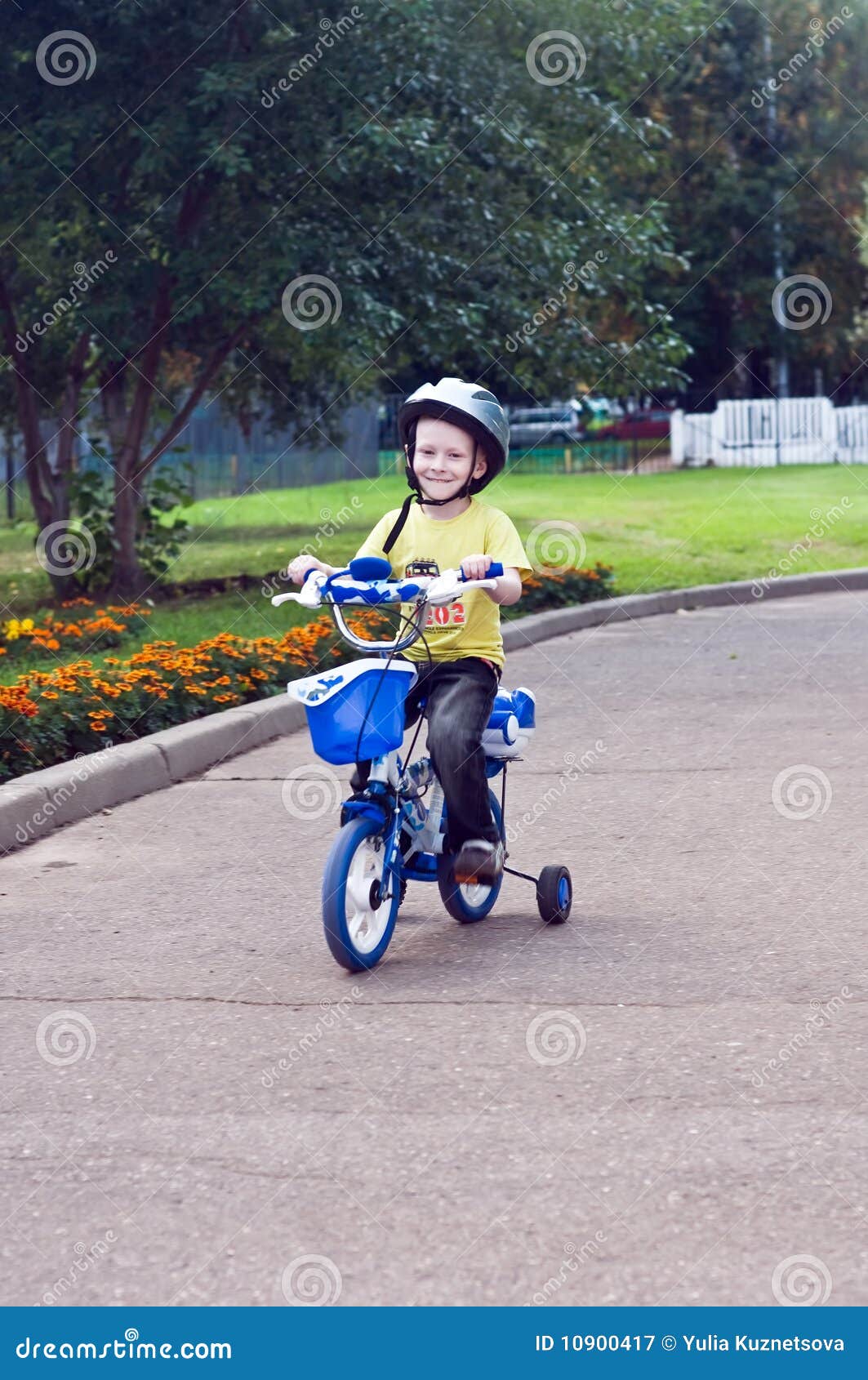 Child cycling stock image. Image of lane, flower, bike - 10900417