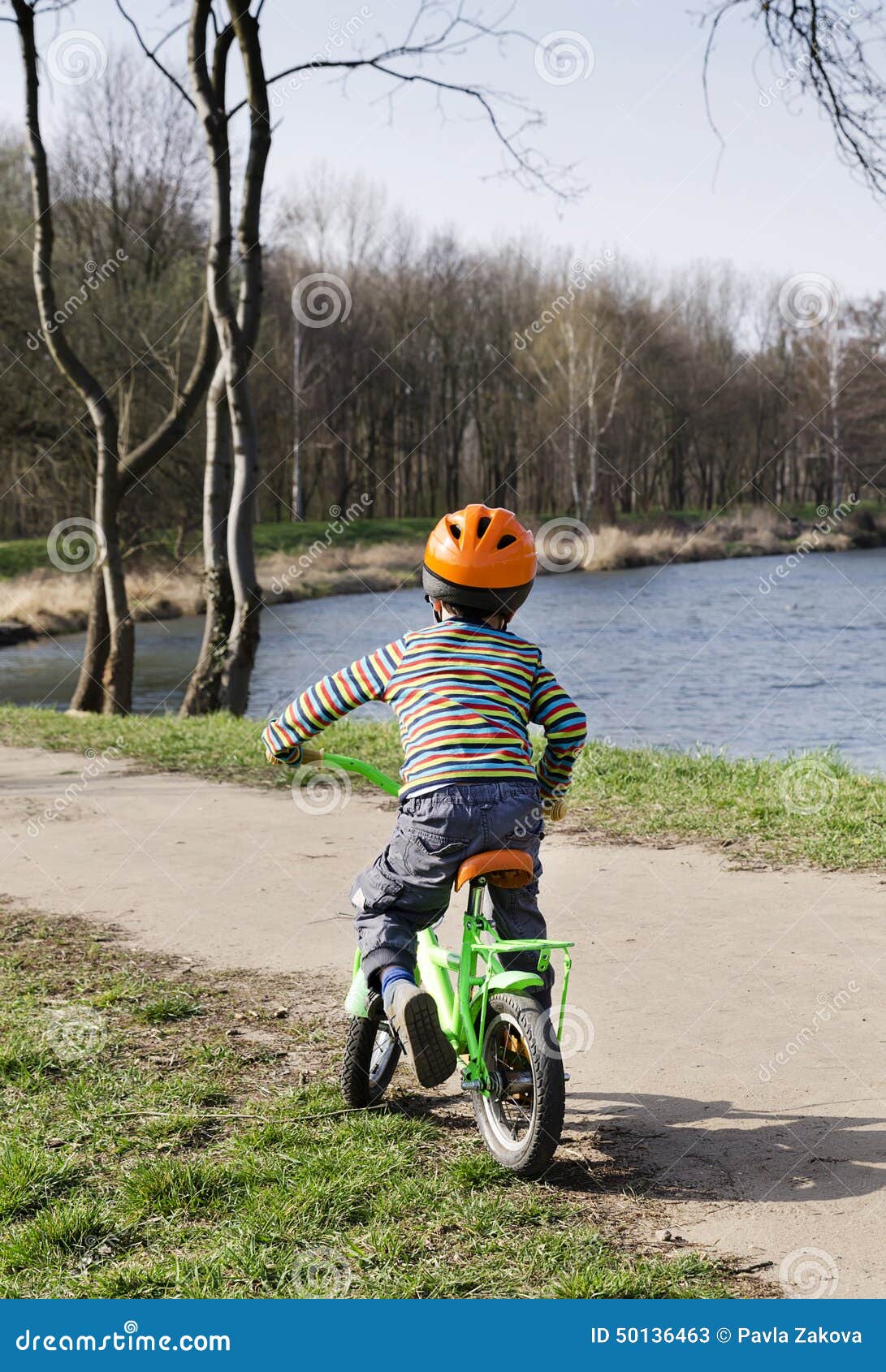 Child cycling stock image. Image of learn, country, lake - 50136463