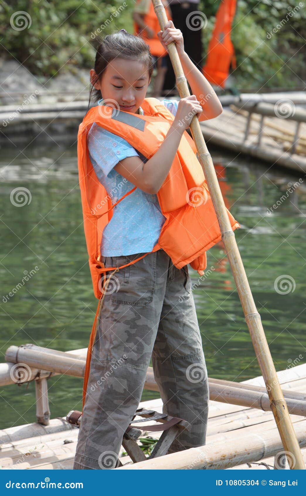 Child is Delimiting the Bamboo Raft Stock Photo - Image of sitting ...