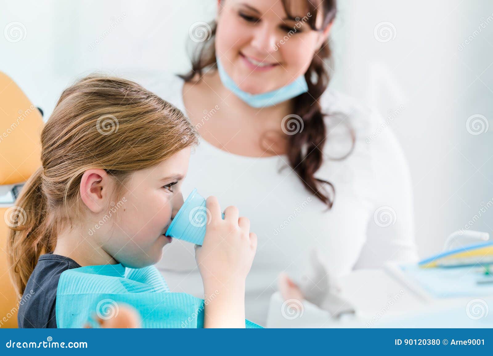 Child in Dentist Surgery Flushing Teeth with Water Stock Photo - Image ...