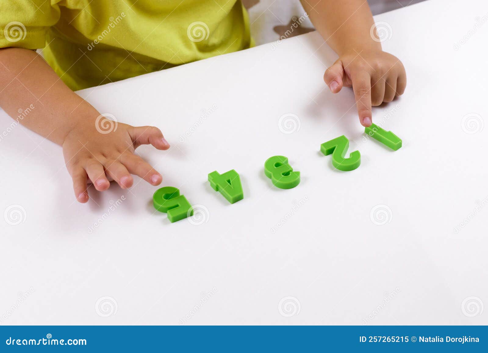 Child Development. Counting Training. the Child Points To the Numbers ...