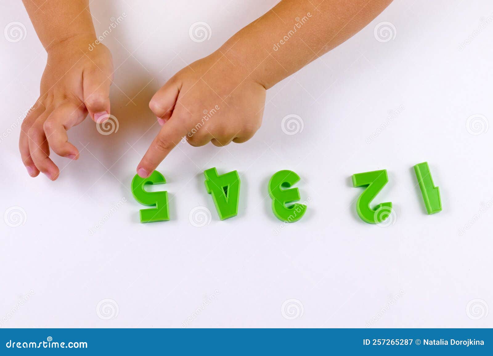 Child Development. Counting Training. the Child Points To the Numbers ...