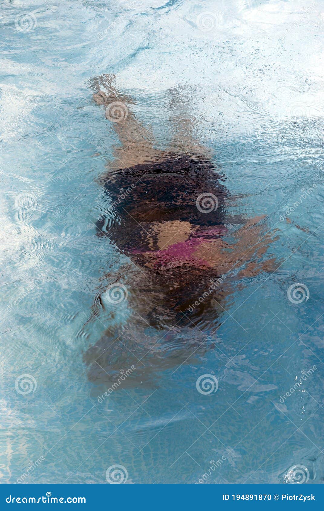 Child diving in the pool stock photo. Image of snorkeling - 194891870