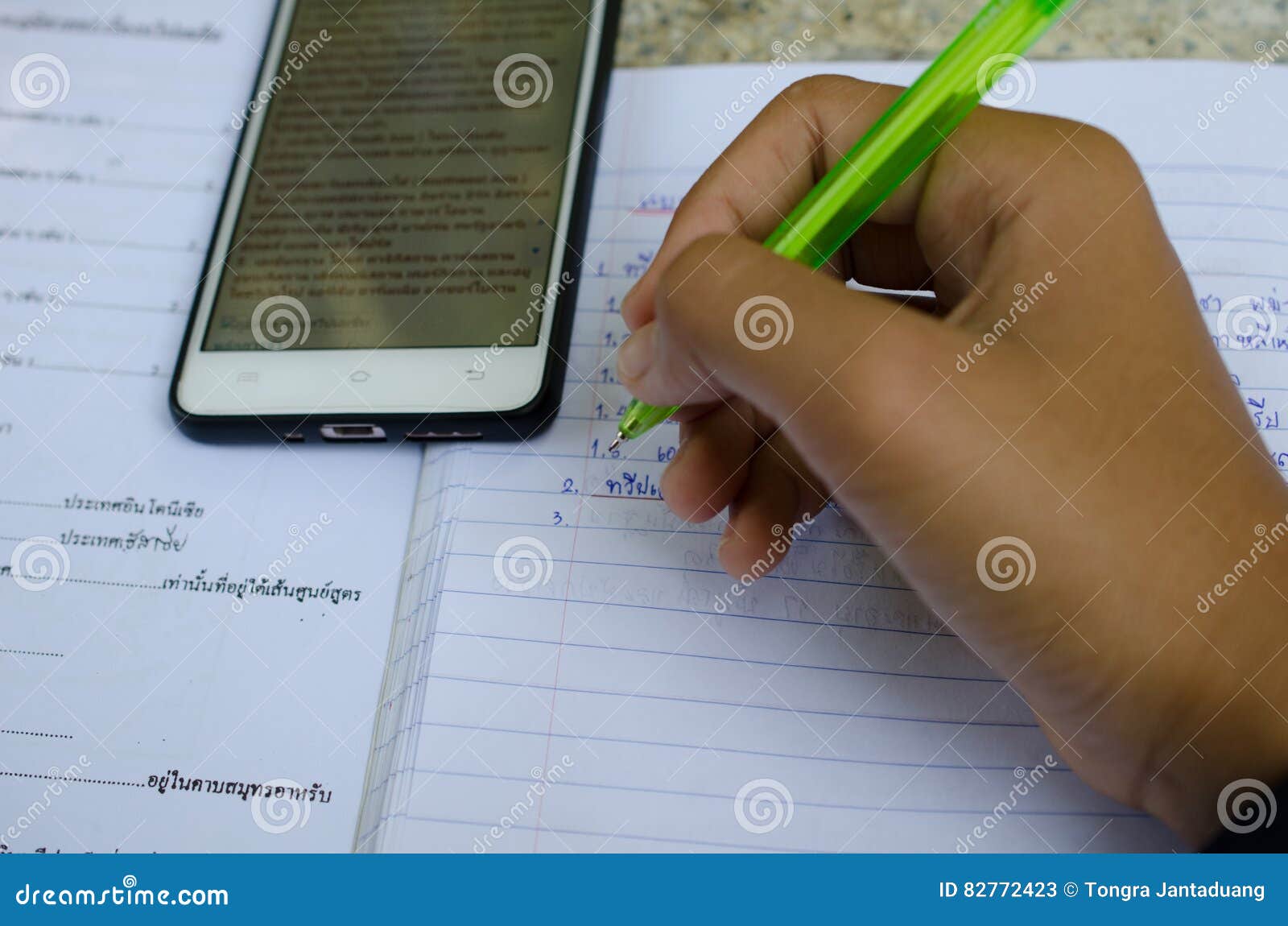 Child Do His Homework. Notebook for Mathematic. Hand Hold Pen Stock ...