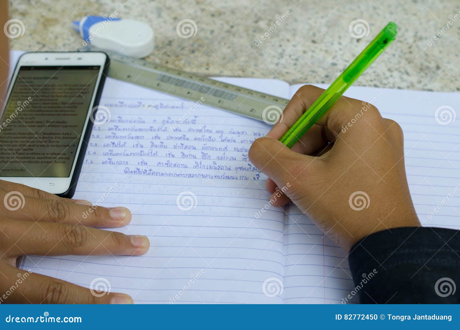 Child Do His Homework. Notebook for Mathematic. Hand Hold Pen Stock ...