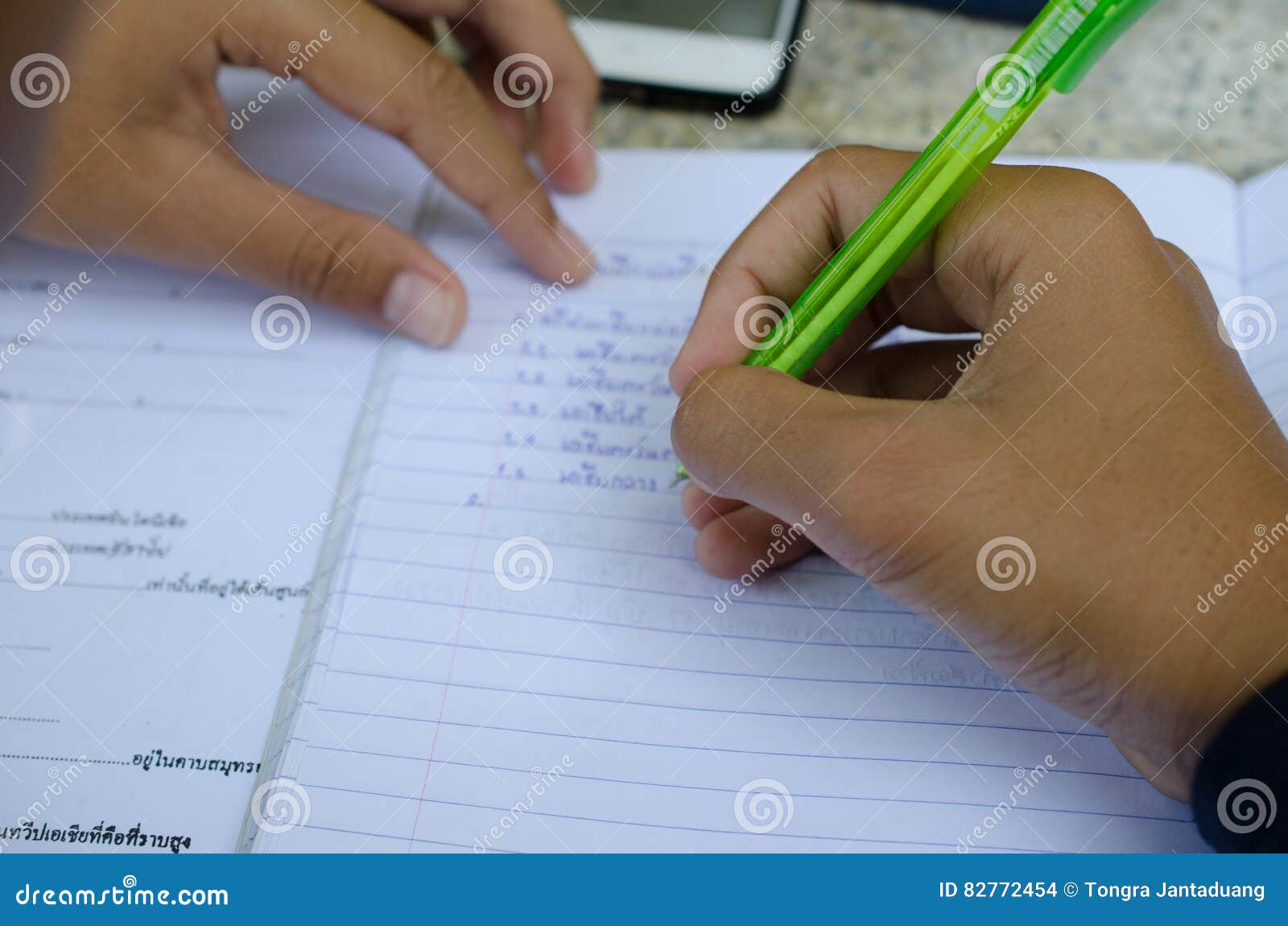 Child Do His Homework. Notebook for Mathematic. Hand Hold Pen Stock ...
