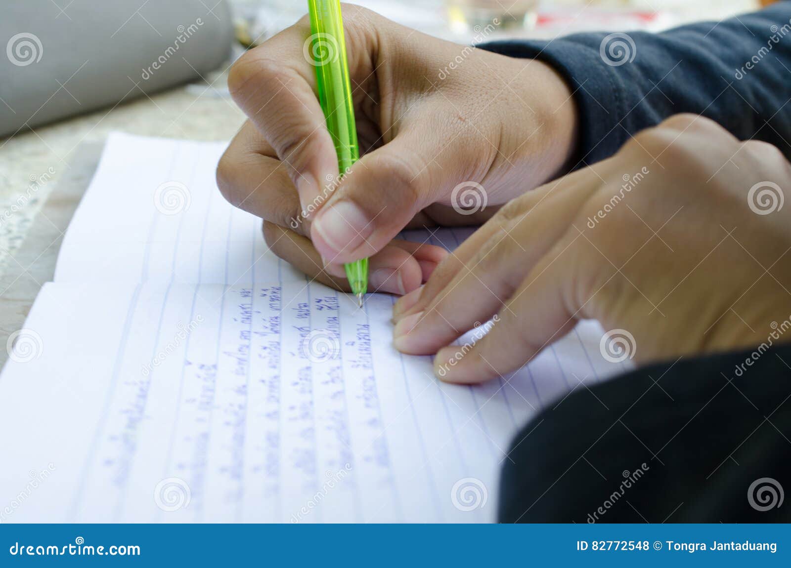 Child Do His Homework. Notebook for Mathematic. Hand Hold Pen Stock ...