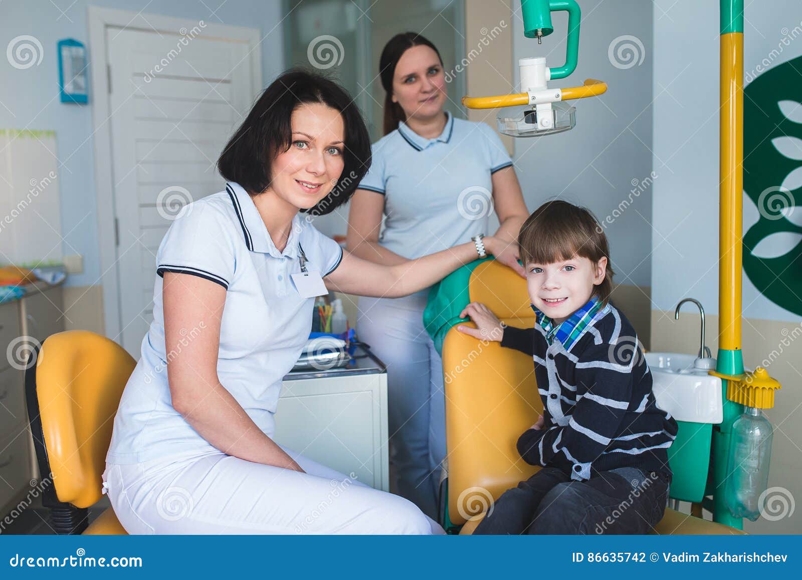 Child with Doctor and Assistance Stock Photo - Image of dental ...