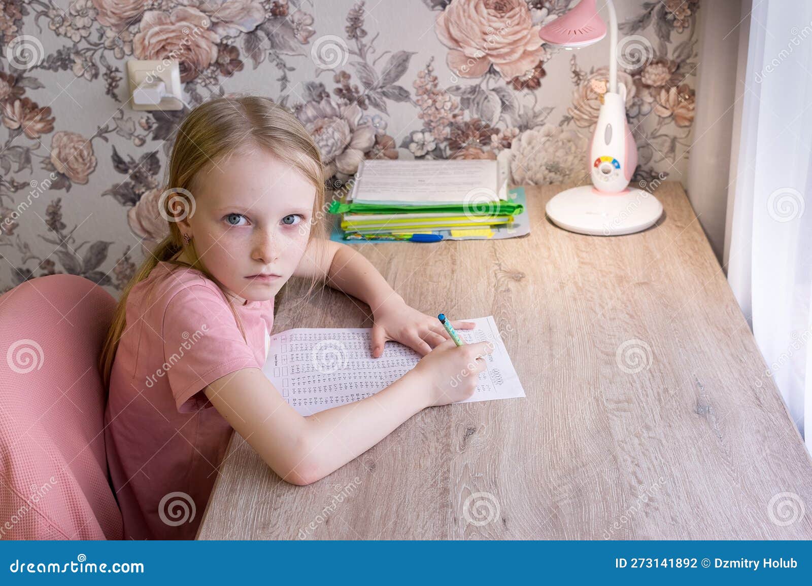 The Child Does Homework Lessons at the Table Stock Photo - Image of ...