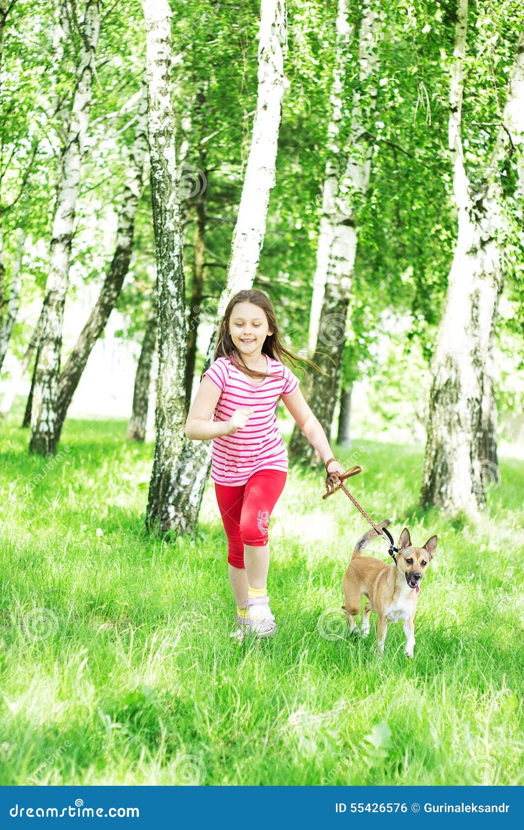 Child and dog running stock photo. Image of enjoyment - 55426576
