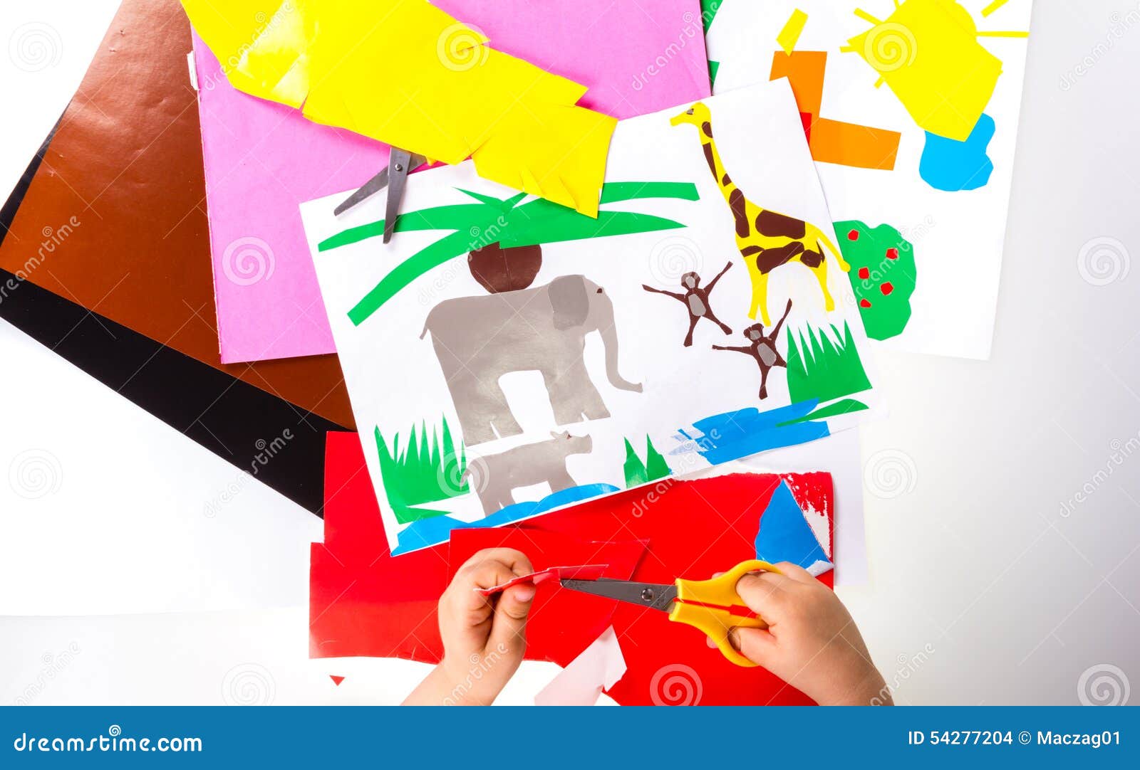 Child doing cutouts stock photo. Image of crafts, school - 54277204