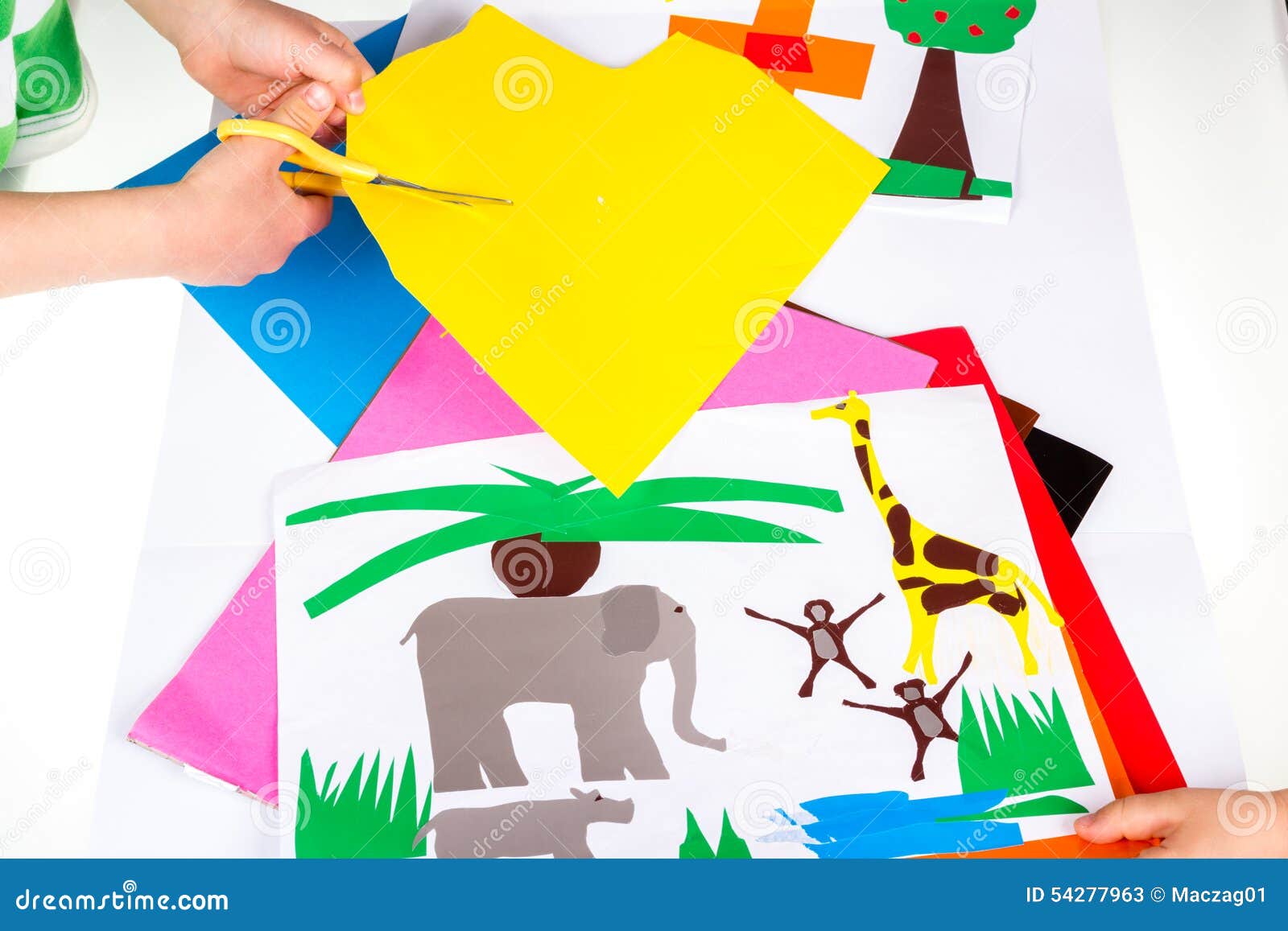 Child doing cutouts stock image. Image of supplies, view - 54277963