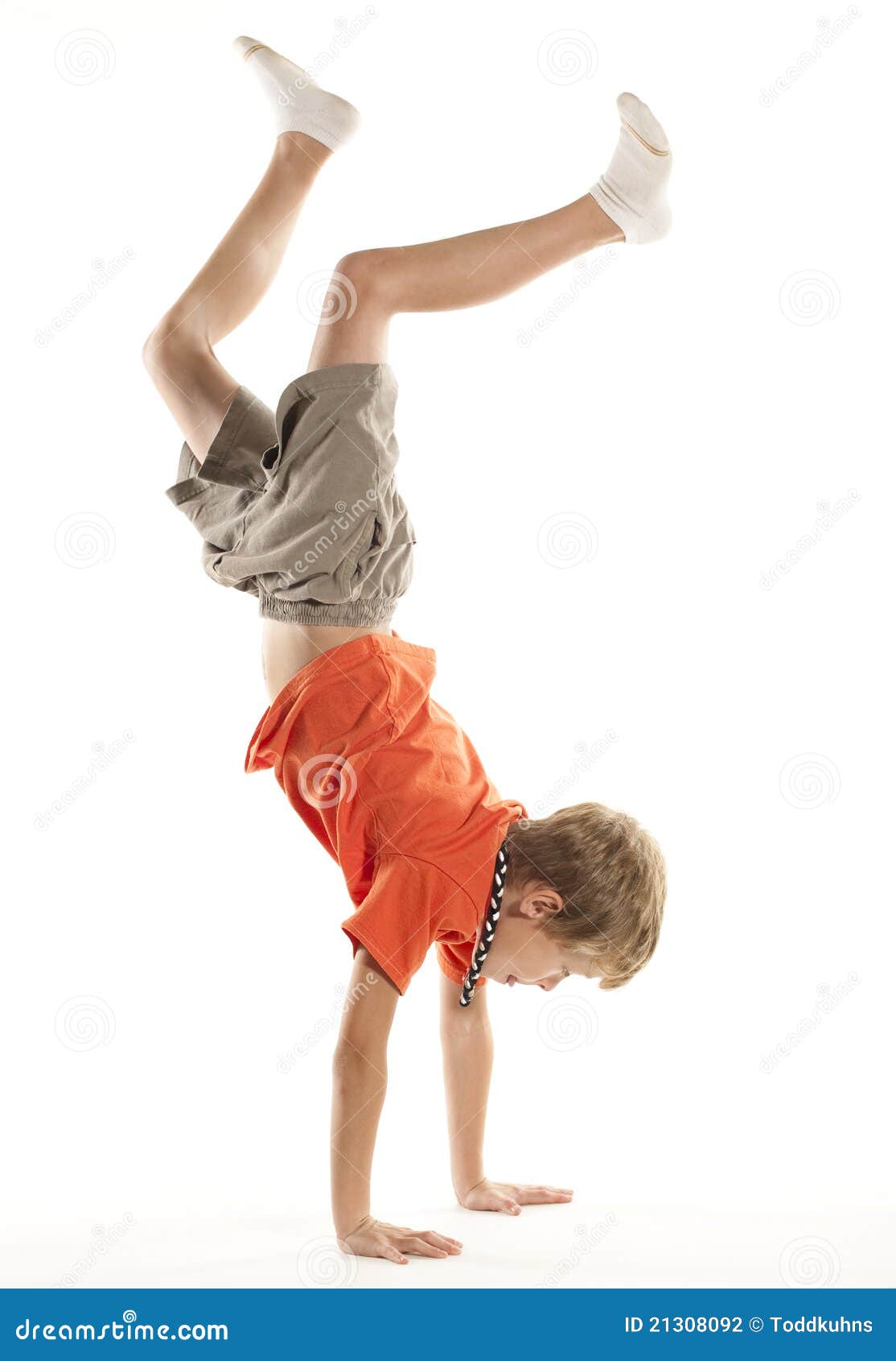 Child Doing a Hand Stand stock photo. Image of pose, playful - 21308092