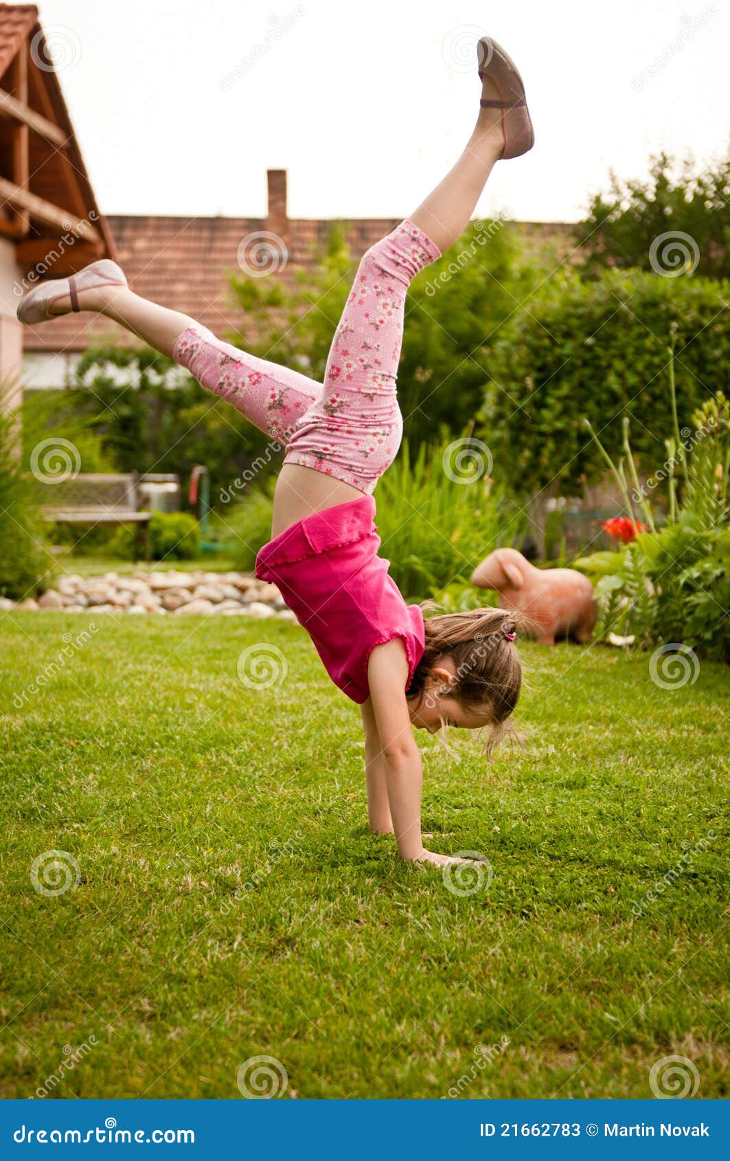 Child Doing Handstand in Backyard Stock Image - Image of handstand ...
