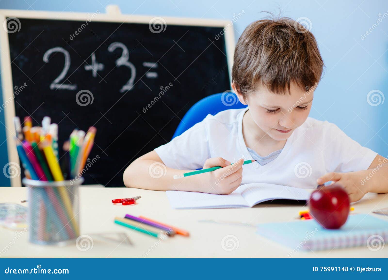 Child doing his homework stock photo. Image of back, learning - 75991148