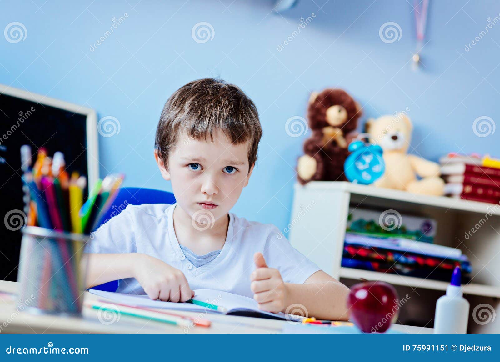 Child doing his homework stock image. Image of schoolchild - 75991151