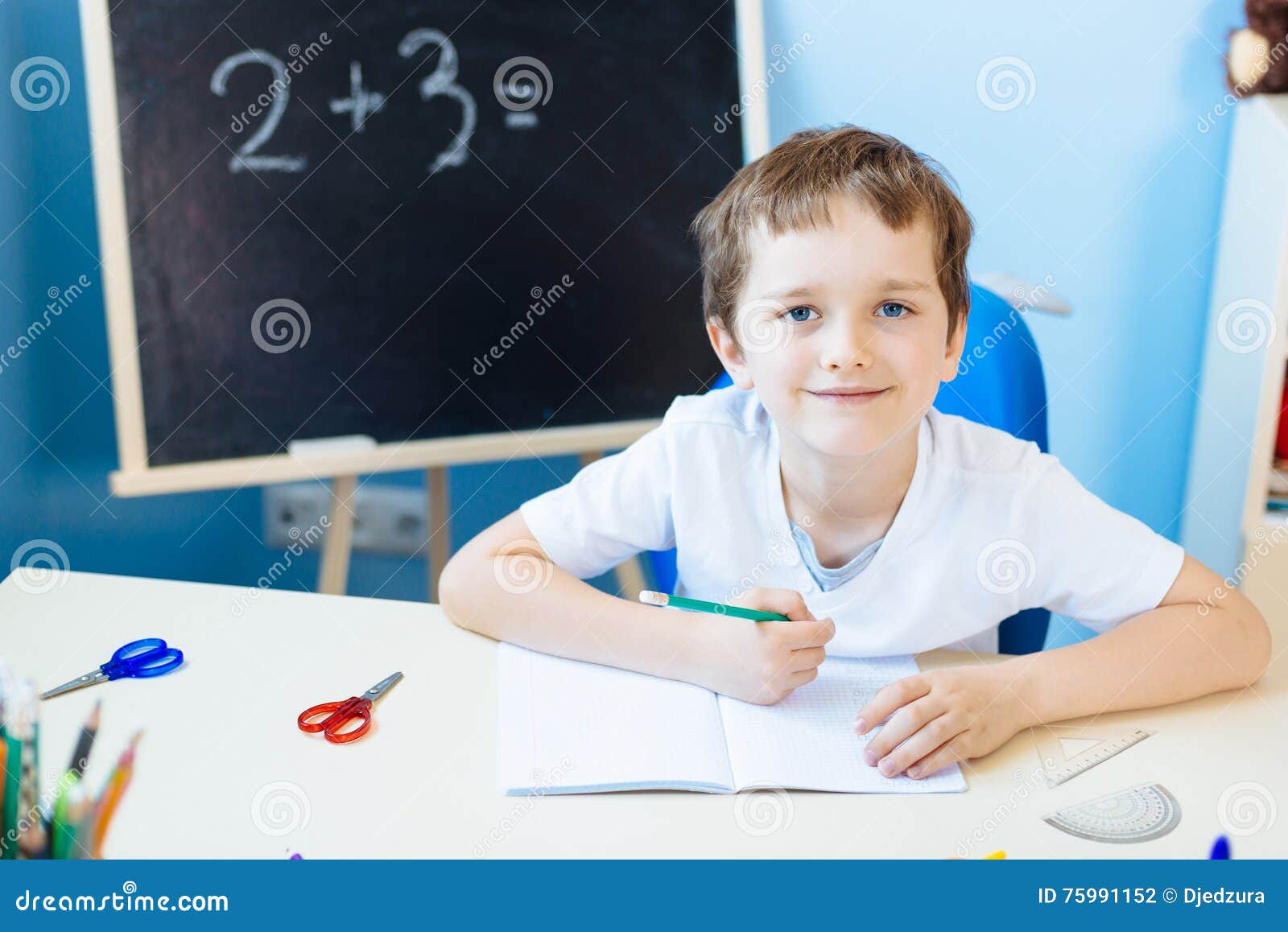 Child doing his homework stock photo. Image of learn - 75991152