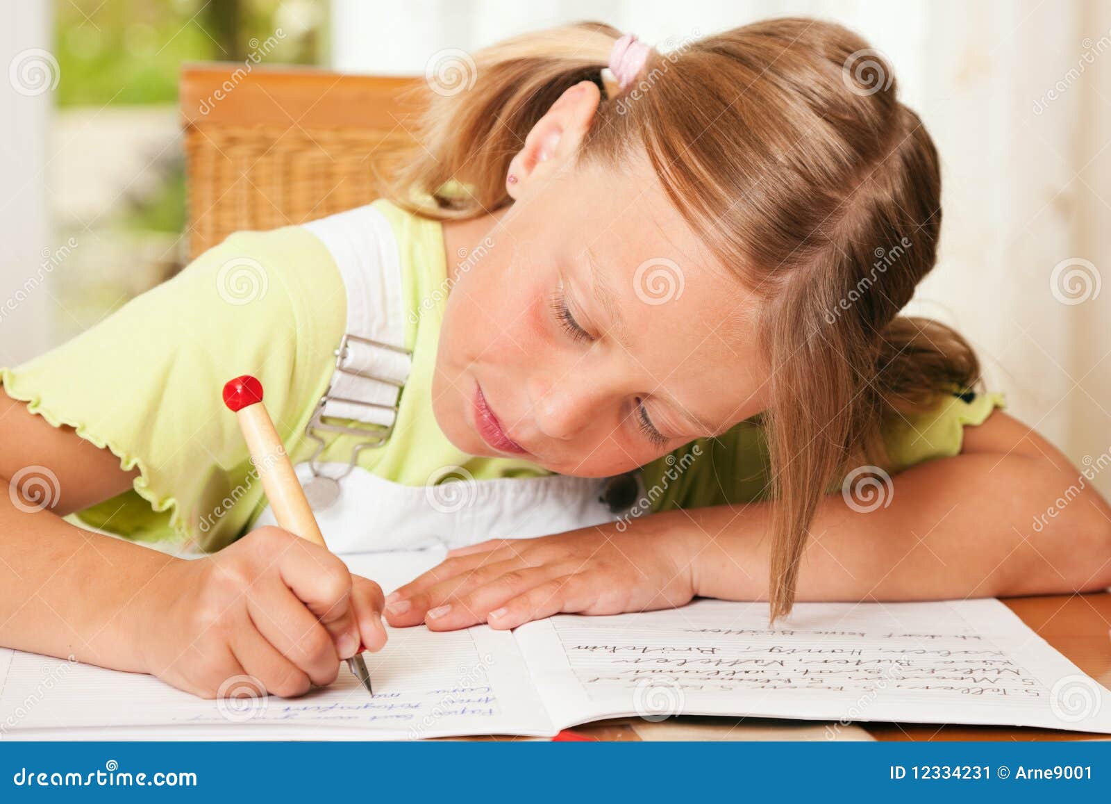 Child doing homework stock image. Image of concentrate - 12334231