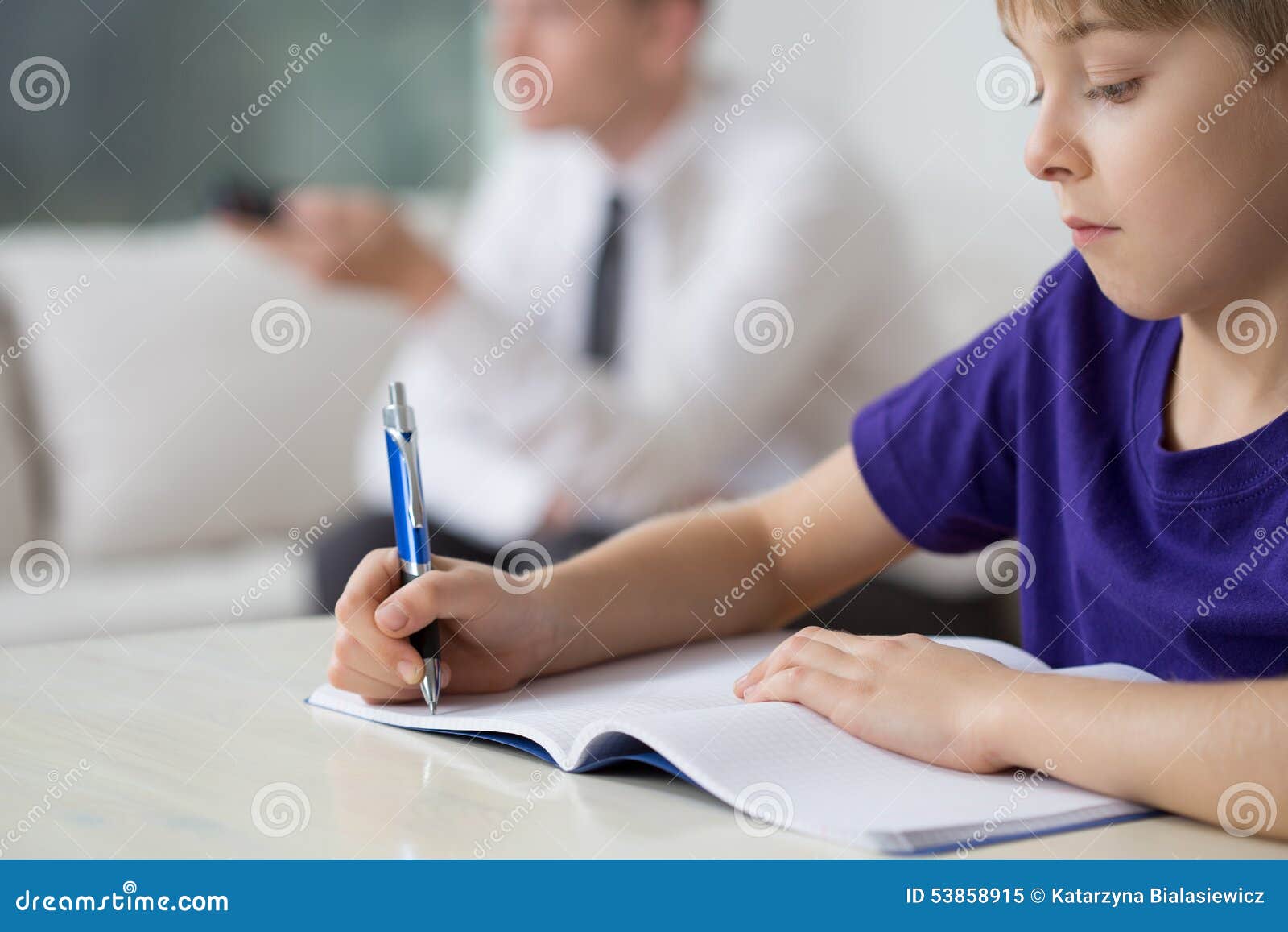 Child doing homework alone stock image. Image of person - 53858915