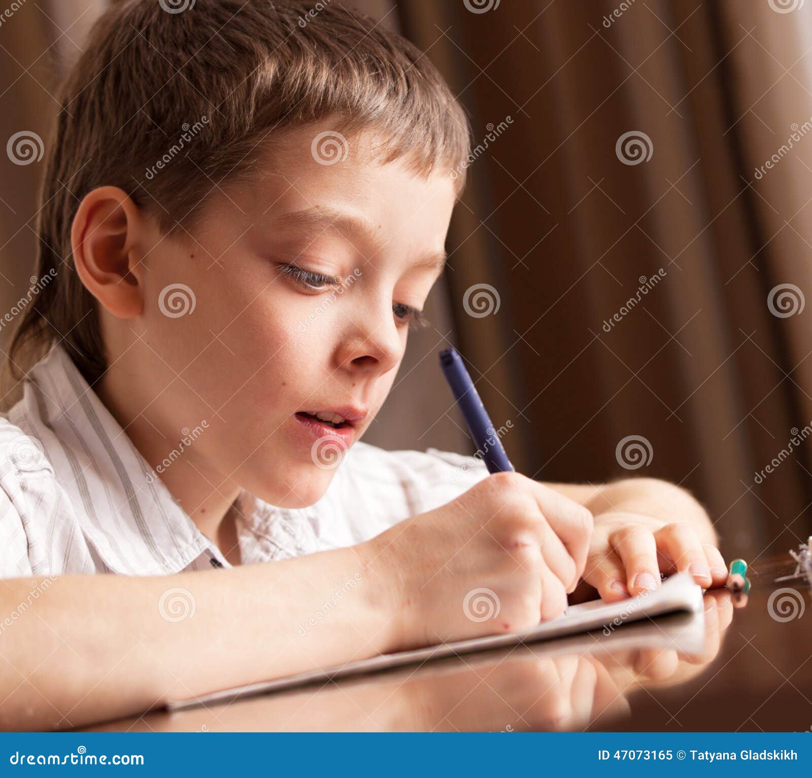 Child doing homework stock image. Image of elementary - 47073165