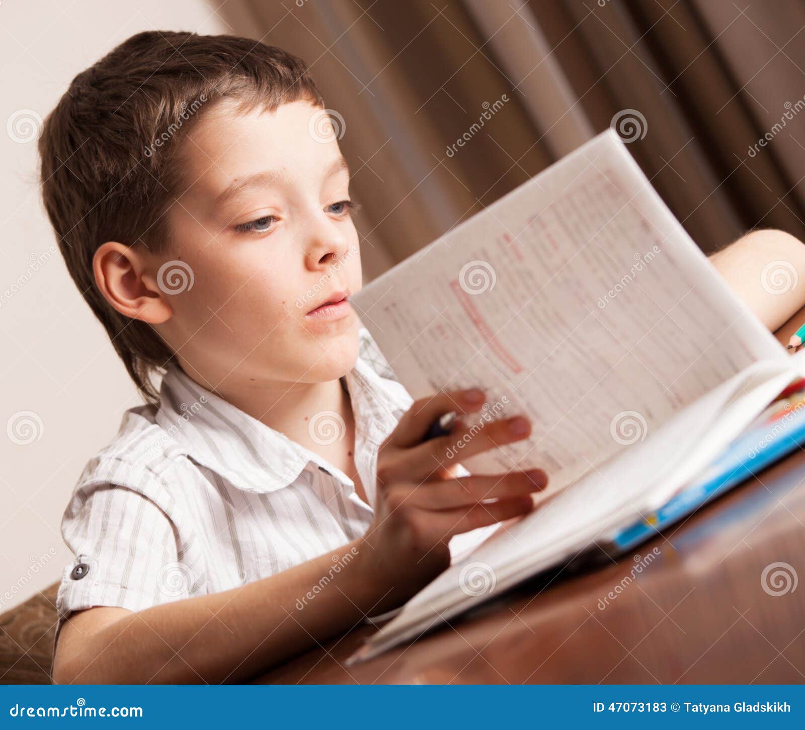 Child doing homework stock image. Image of home, candid - 47073183