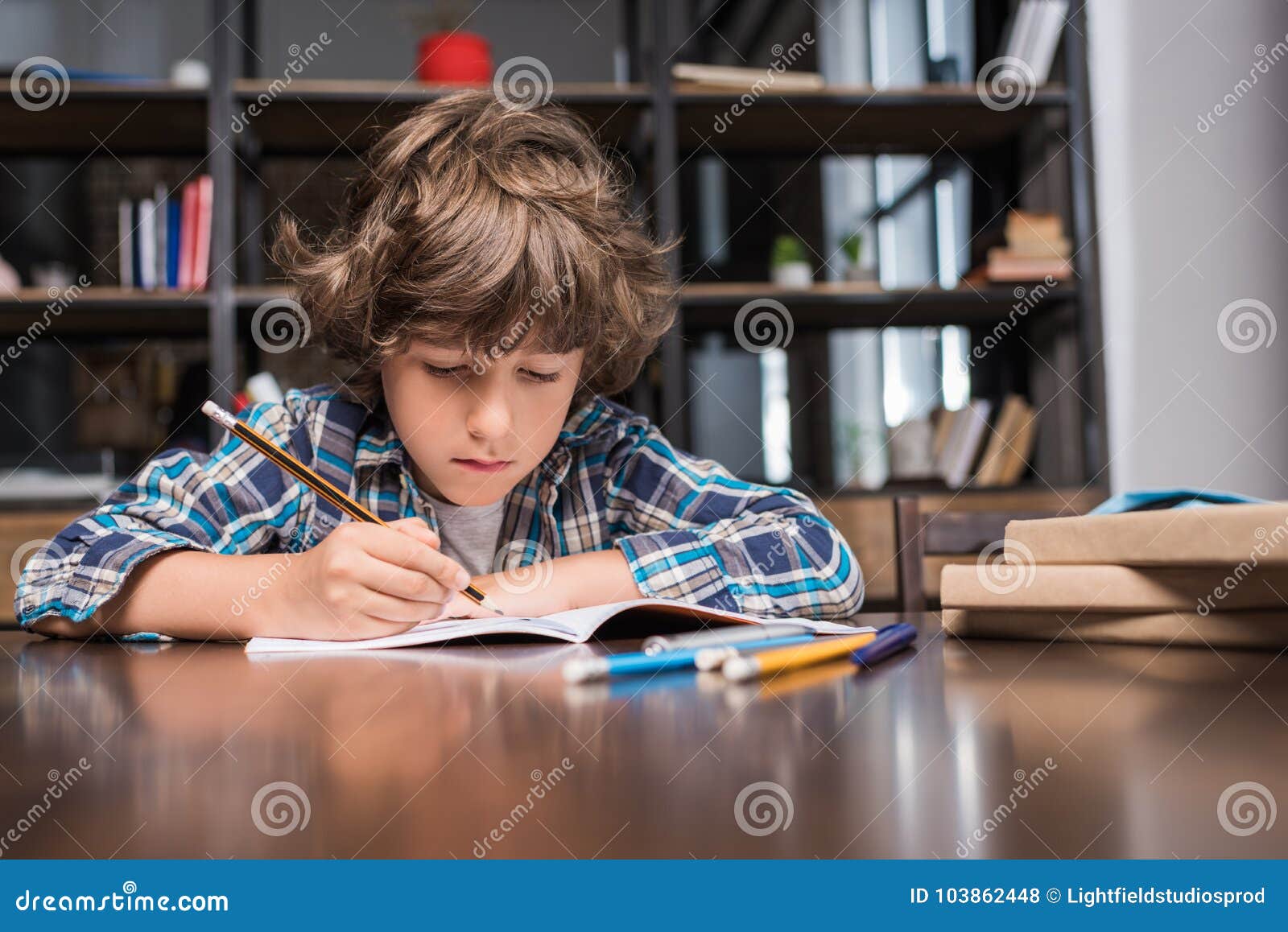 Child doing homework stock photo. Image of people, candid - 103862448