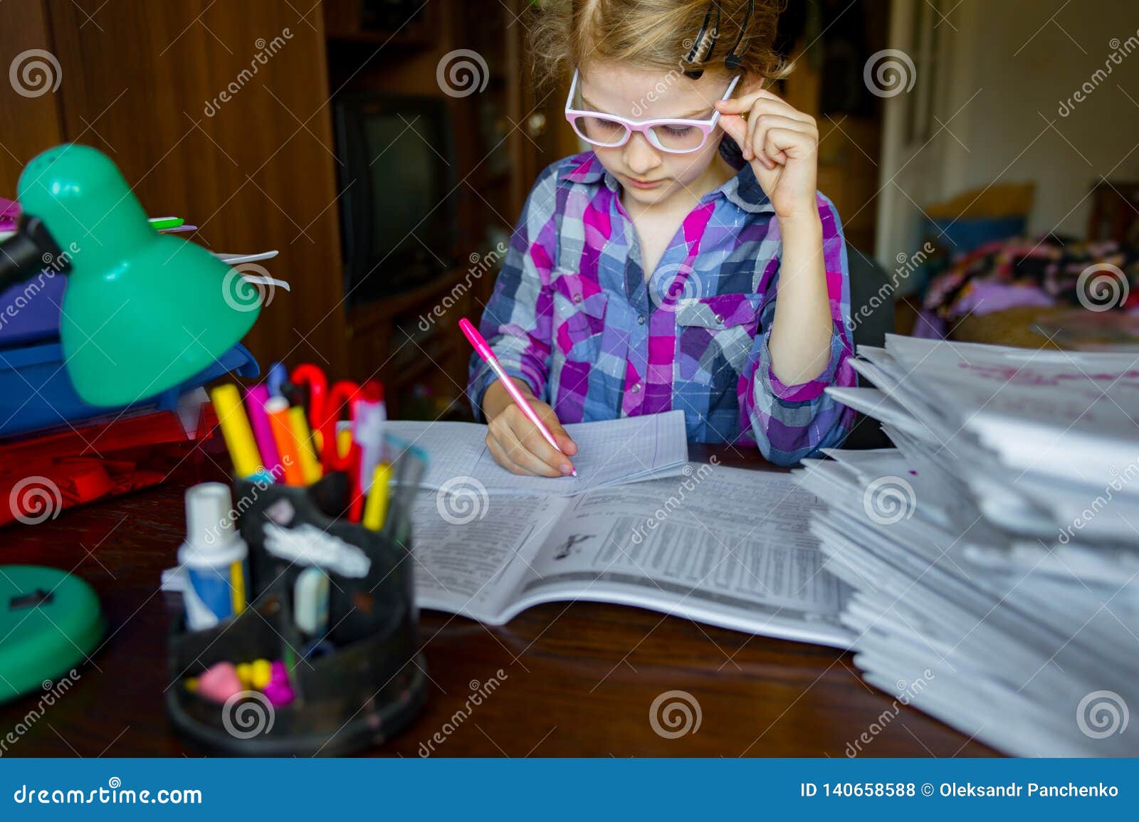 Child Doing Homework in Glasses for Improving Vision Stock Photo ...