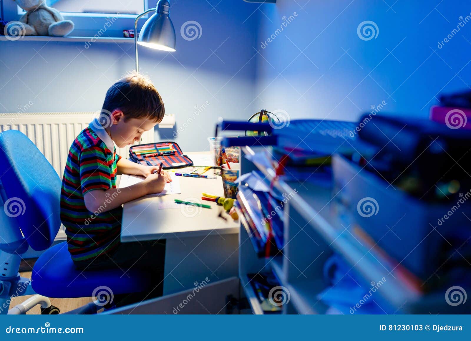 Child is Doing Homework in the Light of the Lamp Stock Image - Image of ...