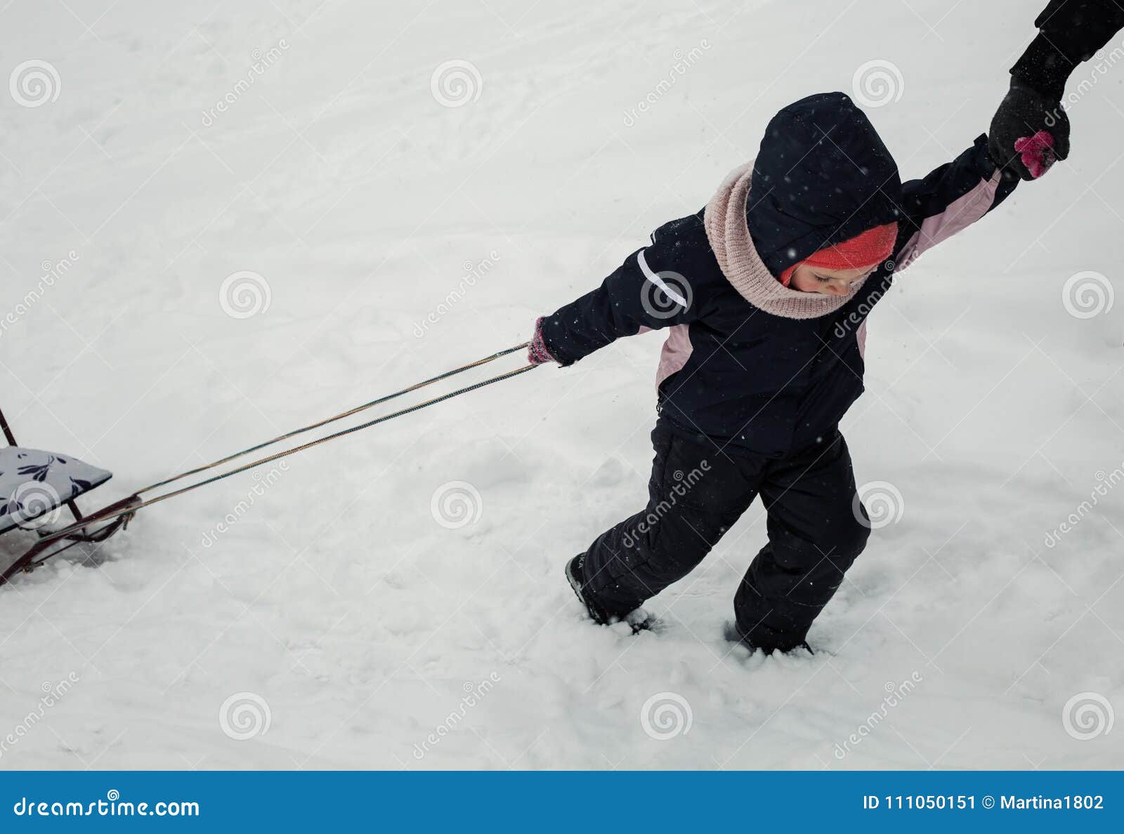 Child is Dragging the Sleigh Stock Image - Image of parents, back ...