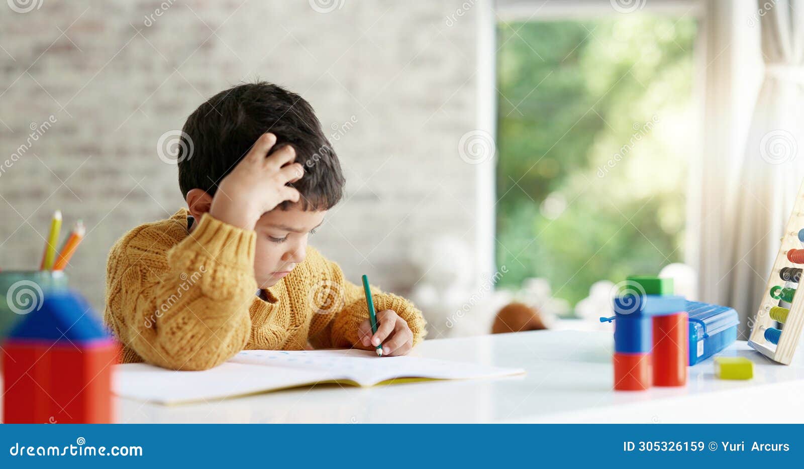 Child, Drawing or Boy Writing Homework on Notebook in Kindergarten ...