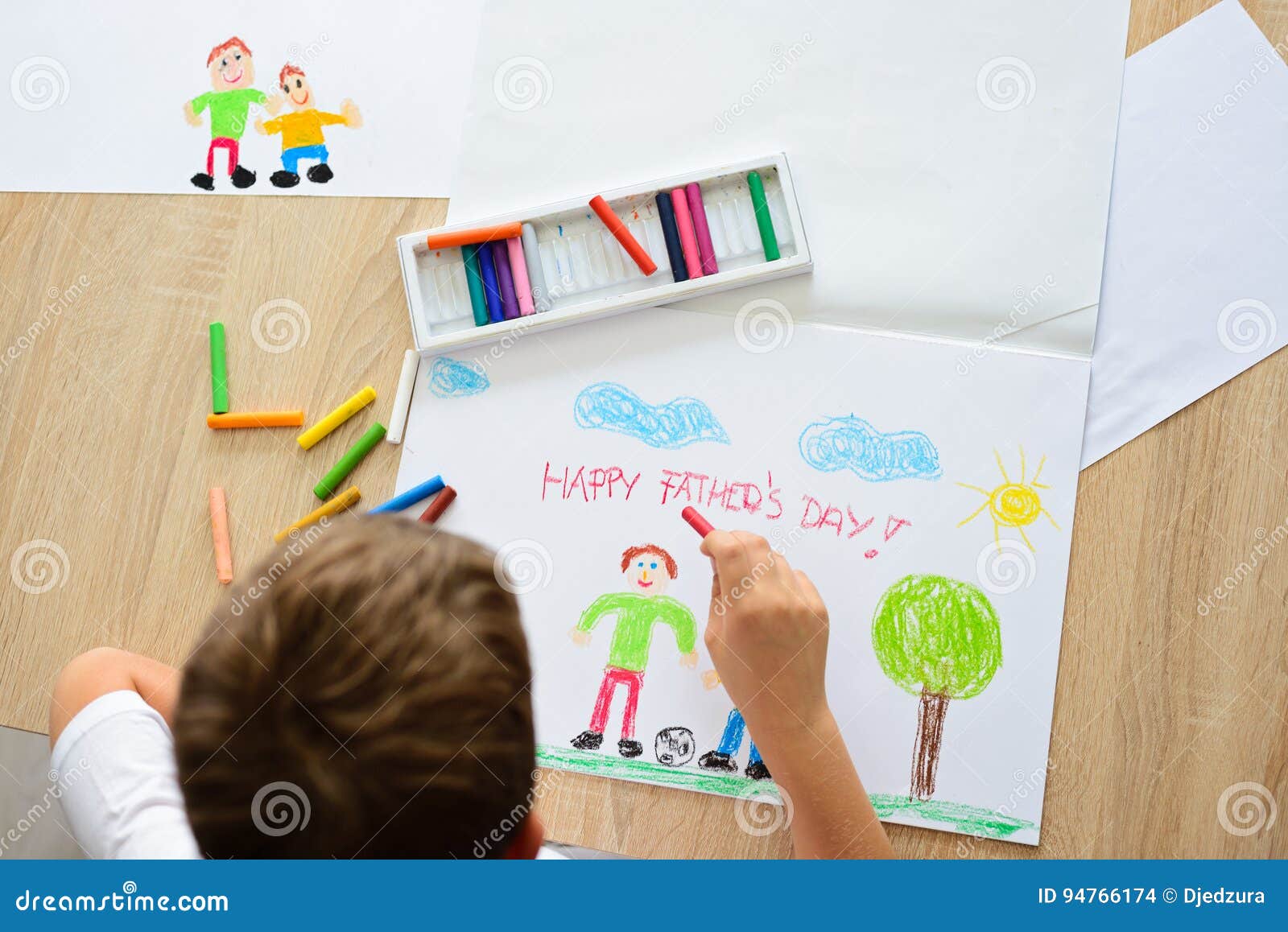 Child Drawing a Card for Daddy Stock Photo - Image of pencils, crayons ...