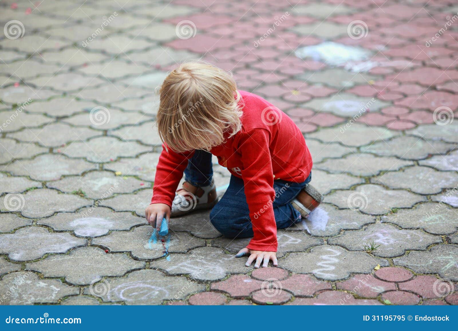 Child drawing with chalk stock image. Image of blond - 31195795