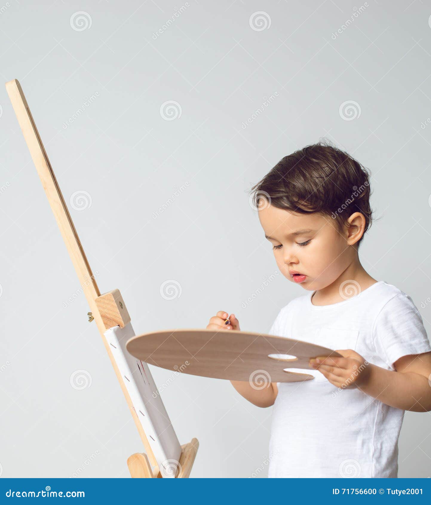 Child Drawing on the Easel Isolated Stock Photo - Image of paper ...