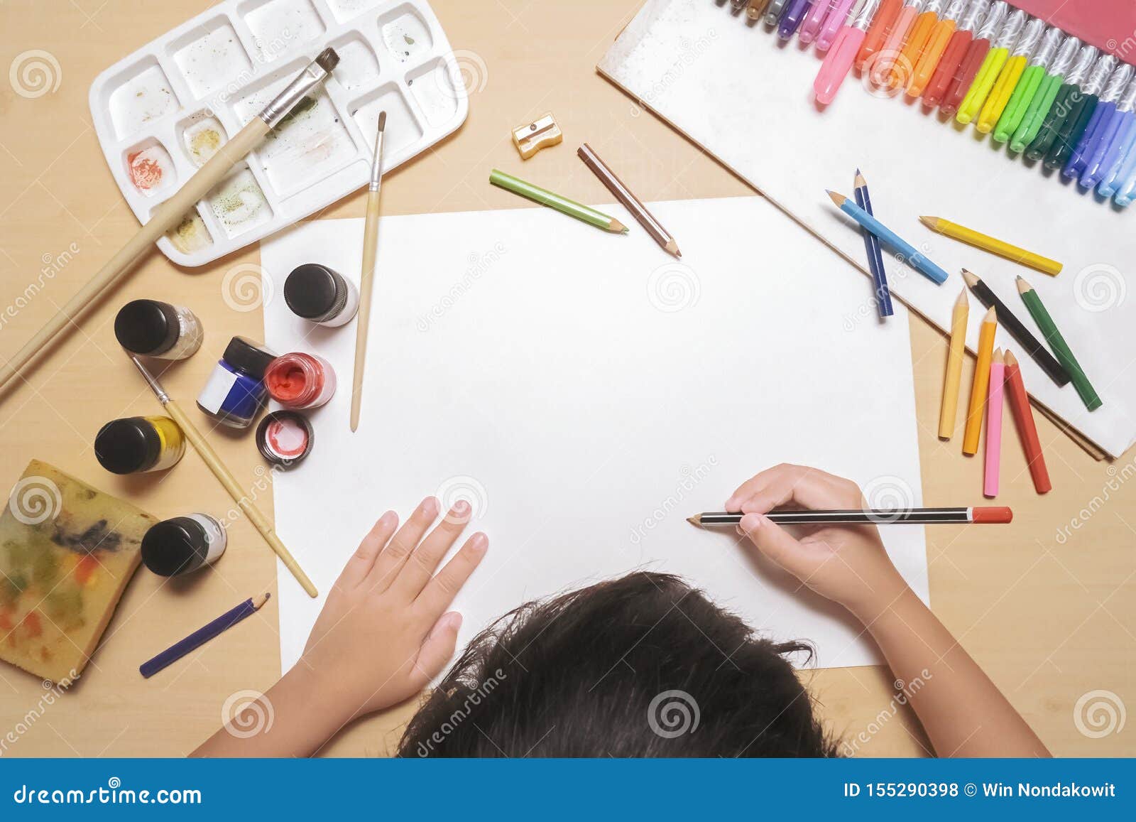 Child drawing on paper stock photo. Image of pencil - 155290398