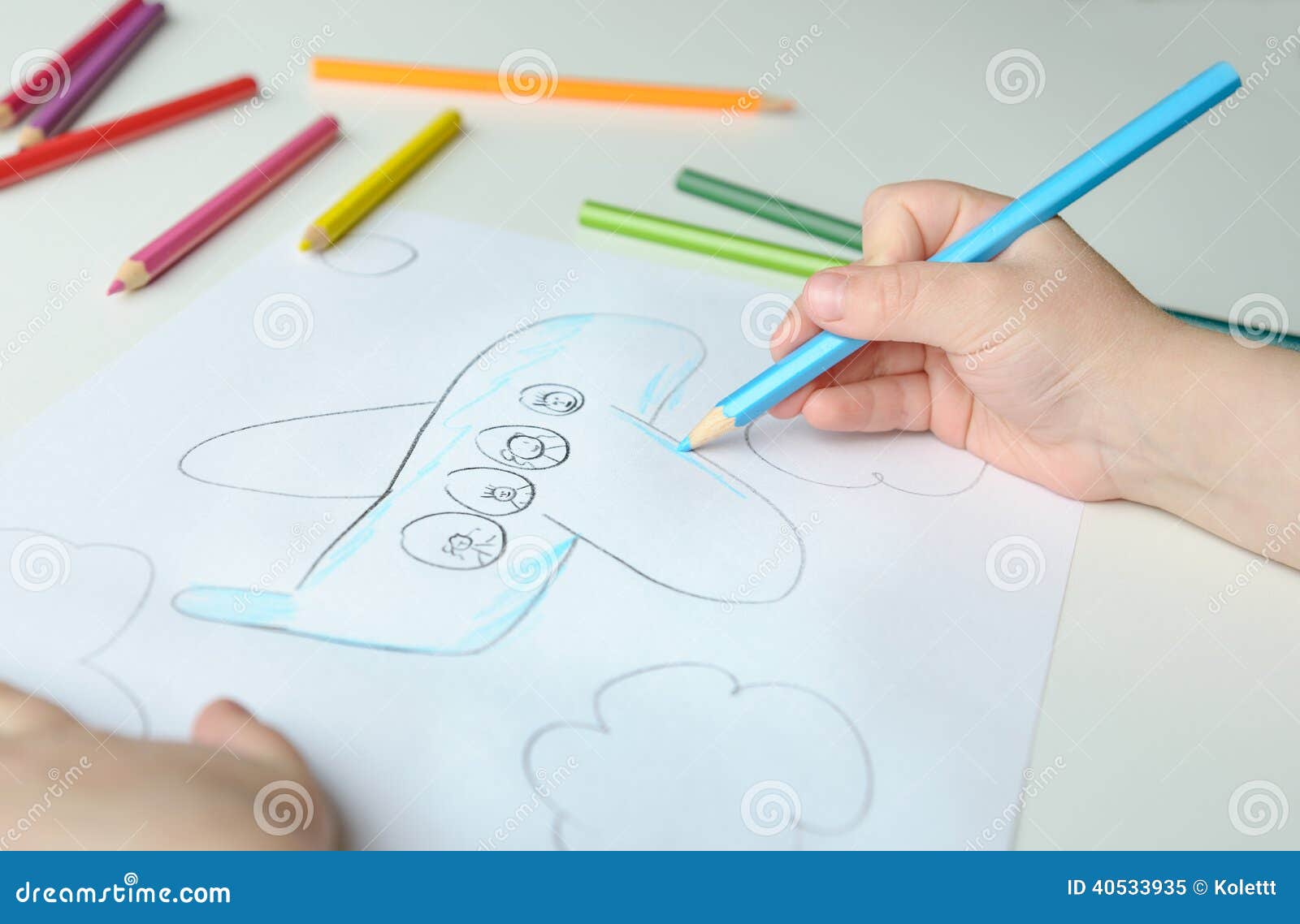Child drawing a plane stock image. Image of hands, pencil - 40533935