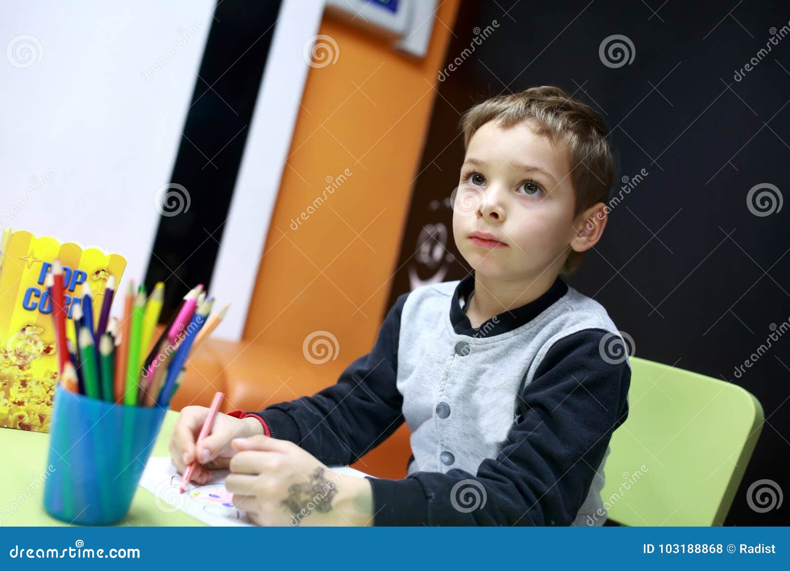 Child drawing at table stock photo. Image of education - 103188868