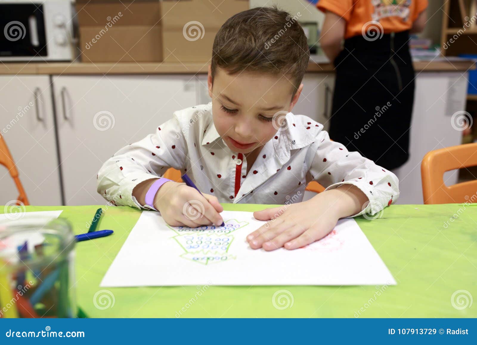 Child drawing at table stock image. Image of learn, cute - 107913729