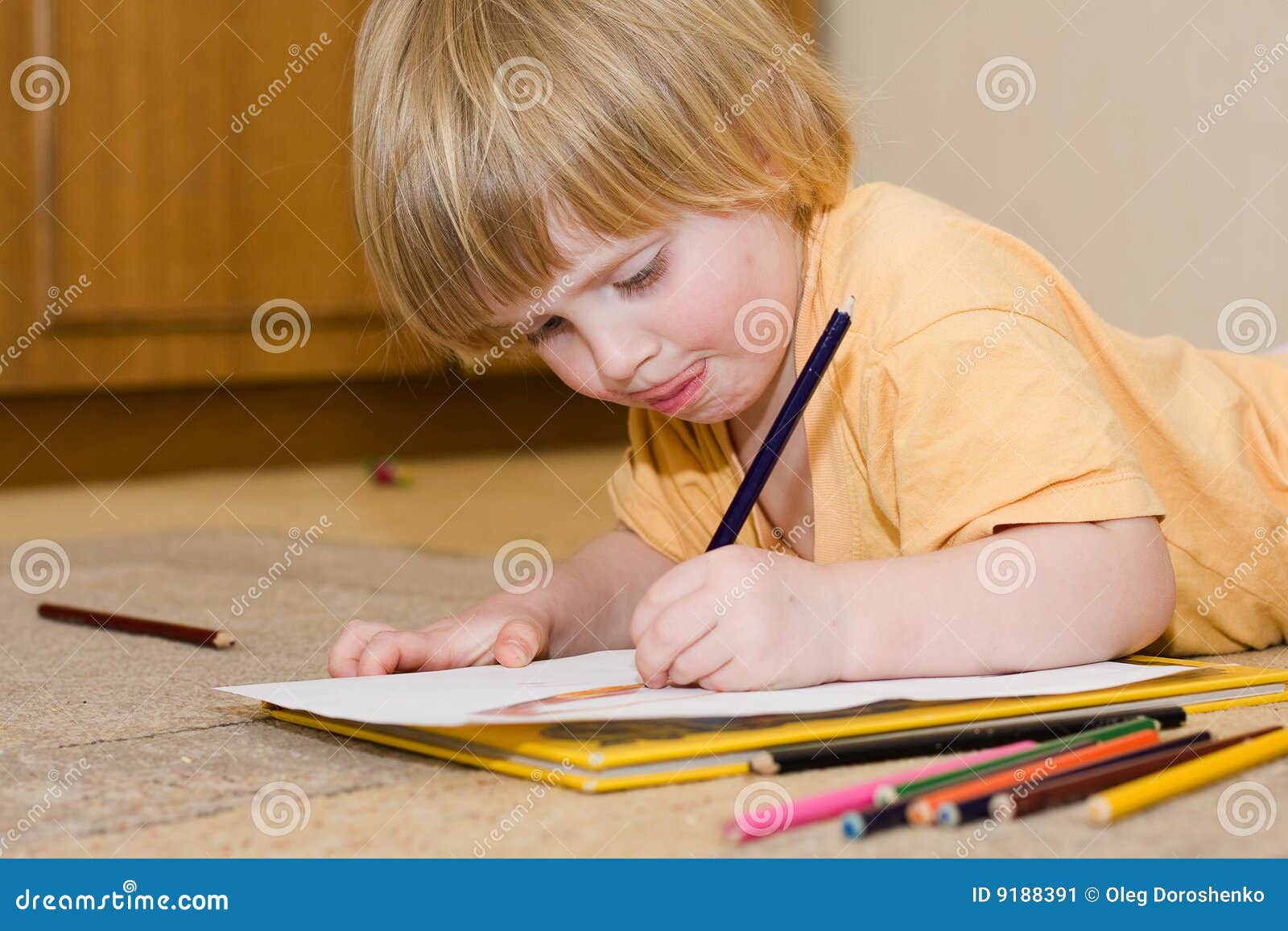 Child draws stock image. Image of focused, happy, lips - 9188391