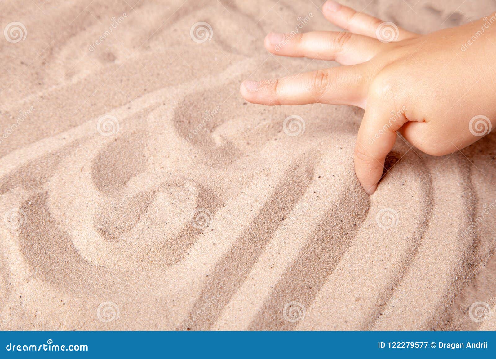 Child Draws a Finger on the Sand Stock Image - Image of ocean, happy ...