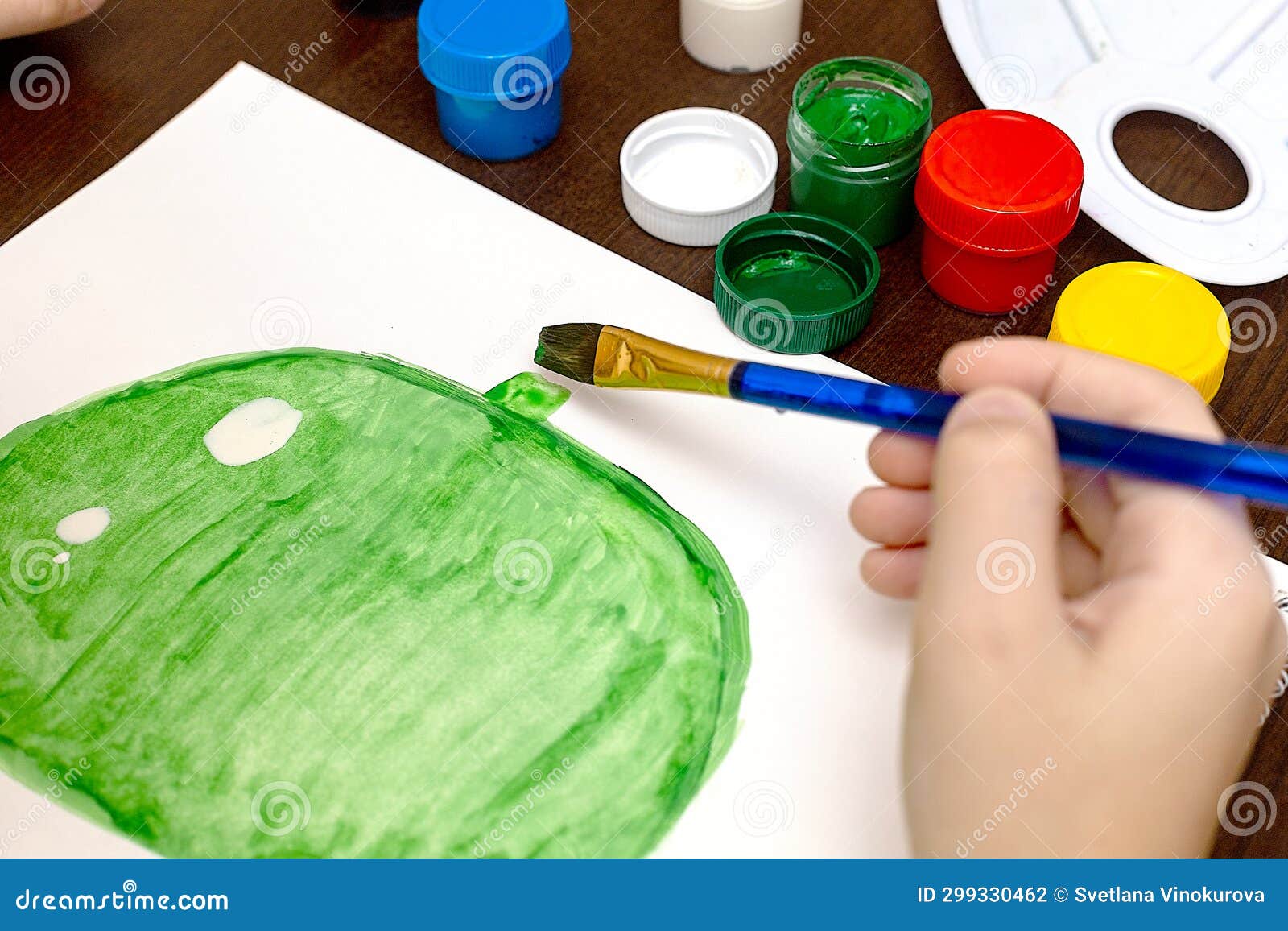 Child Draws the Home Watercolors. the Child Draws with Paints Stock ...